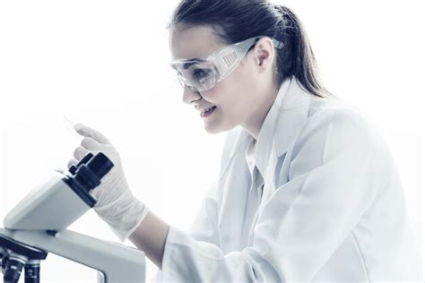 Premium Photo Scientist Using Microscope At Laboratory Over White Background