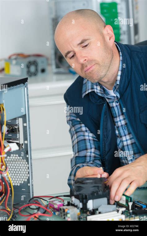 Man Repairing Computer Stock Photo Alamy