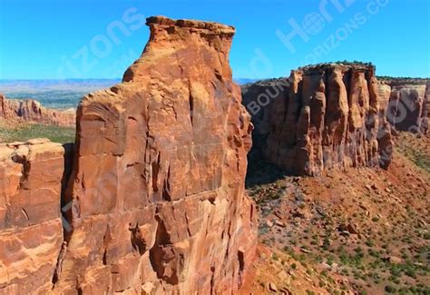 Dramatic Red Butte Against Blue Sky Colorado National Monument