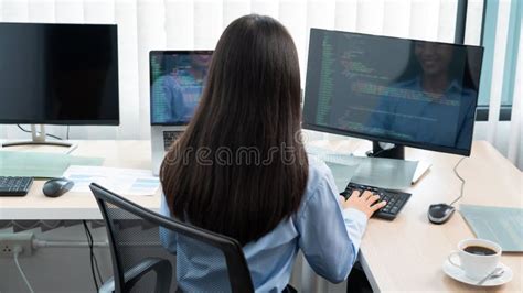 Asian Woman Programmer Typing Source Code With Computer Pc For Developing Program Or Application