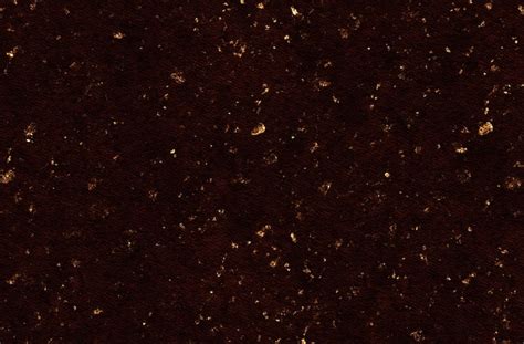 어두운 배경에서 골드 스플래시 무료 사진