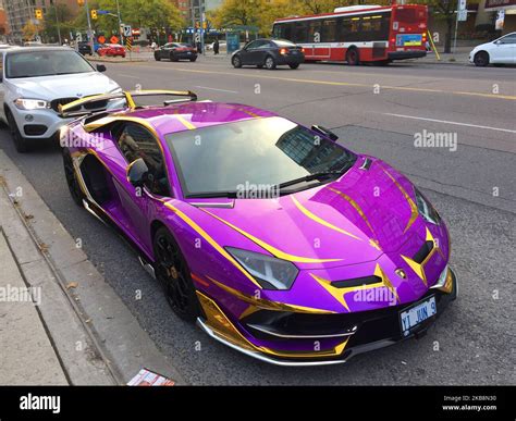 Lamborghini Aventador Svj Parked Outside A Fancy Shop In Toronto