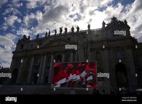 A Giant Screen Shows Cardinals Gathering In The Sistine Chapel During
