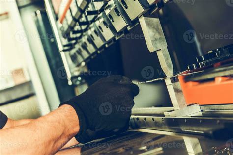 Industrial CNC Bending Machine During Operation Stock Photo At Vecteezy