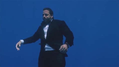 Clothed And Breatholding Barefaced Underwater