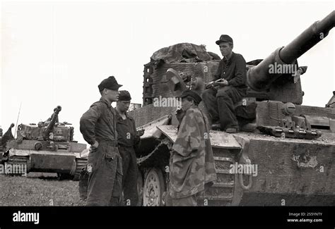 Crew Of German Soldiers On An Armored Vehicle May 1944 Spzabt 503