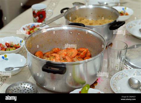 Food Table With Egyptian Rice Cooked On Hot Steam And Cooked Shrimps