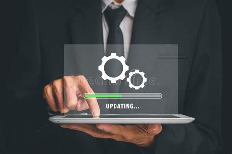 person waiting for installing update process with loading bar icon on virtual screen on tablet