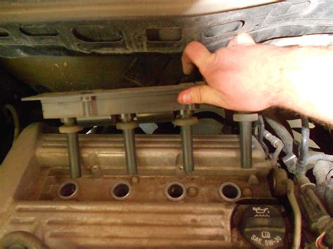 The Bug Babes Saturn Vue Cylinder Spark Plug Change