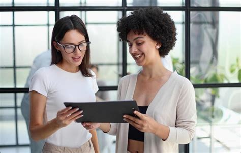 Premium Photo Two Women Analyzing Documents Office Woman Executives