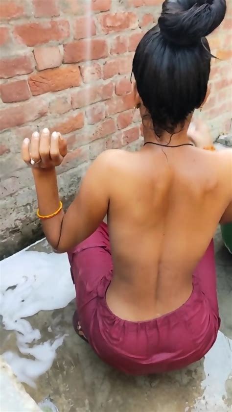 Indian Girl Bathing Outdoor