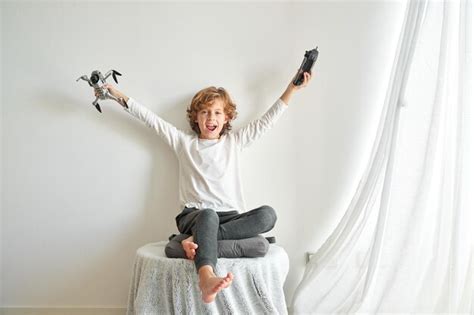 Premium Photo Full Body Of Barefoot Happy Preteen Babe Raising Hands Happily With Gifted New