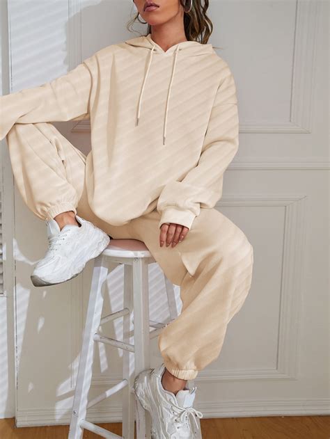 هودي وبنطلون رياضي موحدة اللون منخفض الاكتاف رباط