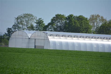 premium photo built structure on field against sky