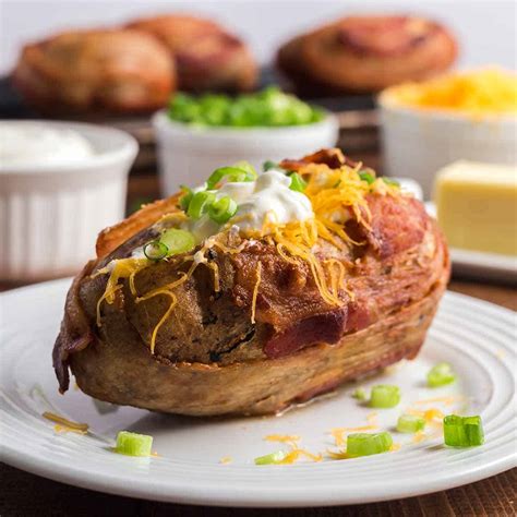 Loaded Baked Potatoes Wrapped In Bacon Sunday Supper Movement