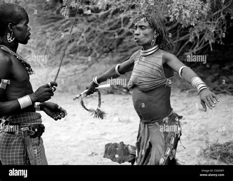 Hamer Woman Getting Flogged By The Whipper During Celebration Of Bull