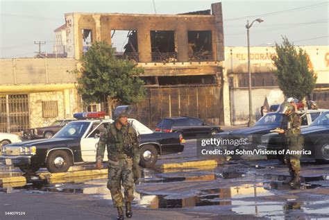 National Guardsmen And Police Cars Patrolling During 1992 Riots