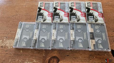 Maxell And Tdk Cassette Tapes Of Varying Lengths And Formulations Photo