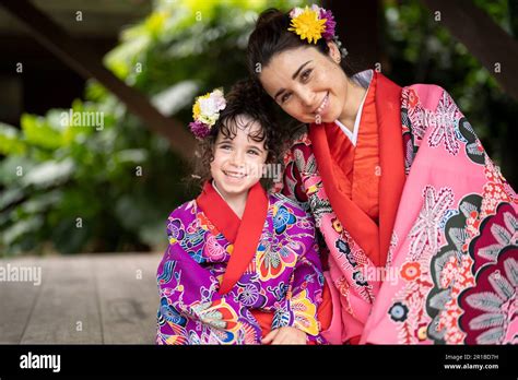Okinawan Mother And Daughter Wearing Traditional Okinawan Ryusou