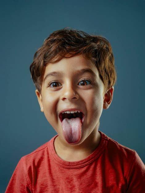 Premium Photo Portrait Of Boy Against Gray Background