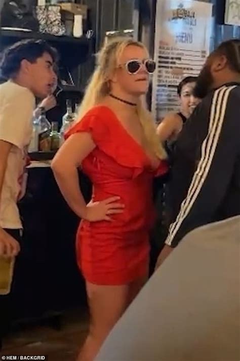 Britney Spears Busts A Move In Very Low Cut Red Dress During Night Out
