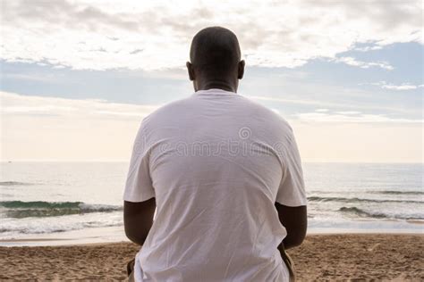 Anonymous Black Man Sitting On Beach Stock Image Image Of Calm Tranquil 266122181
