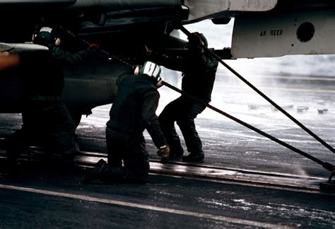 Members Of A Catapult Crew Aboard The Aircraft Carrier Uss Midway Cv