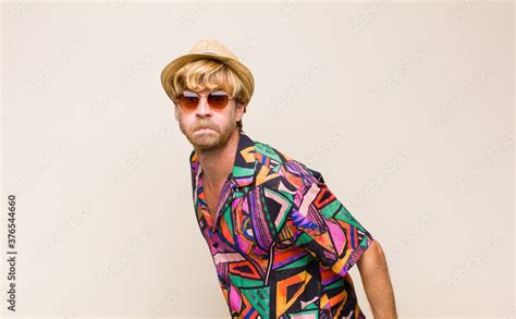 Blonde Adult Traveller Manwith A Goofy Crazy Surprised Expression