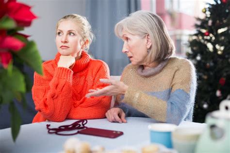 Mature Mother Explains Something To Her Adult Thoughtful Babe Stock Image Image Of People