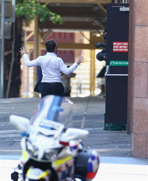 悉尼咖啡馆劫持事件仍僵持已有人质逃出 组图 图片中国中国网