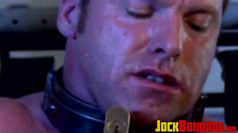 Submissive Man Struggles While In Chains And Dominated