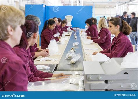 Workers At Assembly Workshop At Industrial Plant Editorial Image