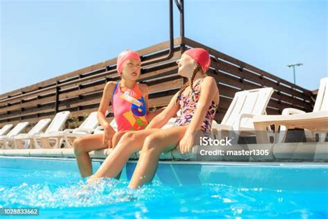 The Portrait Of Happy Smiling Beautiful Teen Girls At The Pool Stock