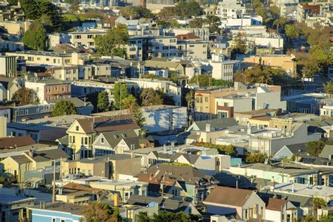 Dense Urban Area With Buildings And Structures Or Homes And Houses In