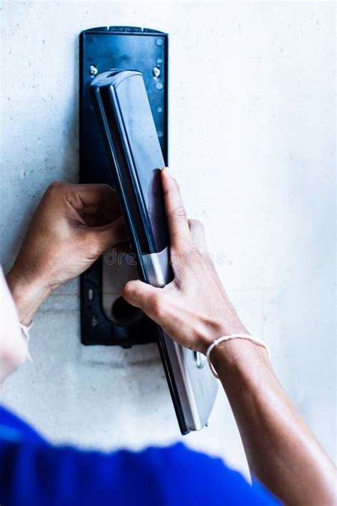 Maintenance Man Repair Control Panel Of Elevator Of The Factory Or