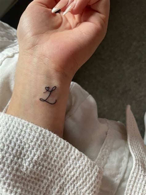 Initial Tattoo Ideas Initial Tattoo L Tattoo Small Hand Tattoos