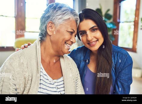 Ill Always Make Time For Her A Beautiful Young Woman Posing With Her