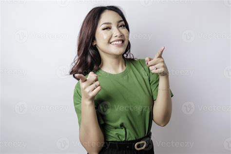 Young Beautiful Asian Girl Standing Over Isolated White Background