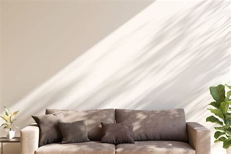 거실 가구 밖에서 햇살이 들어오는 빈 흰색 벽 앞에 있는 커다란 소파 콘텐츠에 대한 템플릿입니다 3d 그림입니다 0명에 대한 스톡 사진 및 기타 이미지 Istock