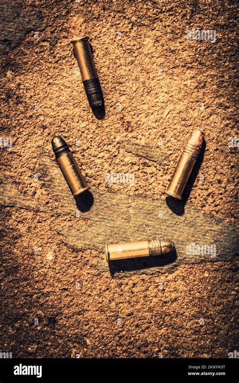 Old Fashioned Still Life Art On 22 Calibre Ammunition On Grungy Background Antique Bullet Art