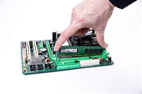 Premium Photo Installing A New Ram Ddr Memory For A Personal Computer Premium Photo Installing A New Ram Ddr Memory For A Personal Computer