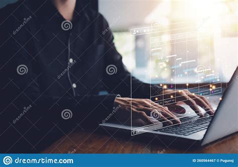 Businessman With Hologram Data Analysis Technology Computer Data Analysis The Use Of Computer