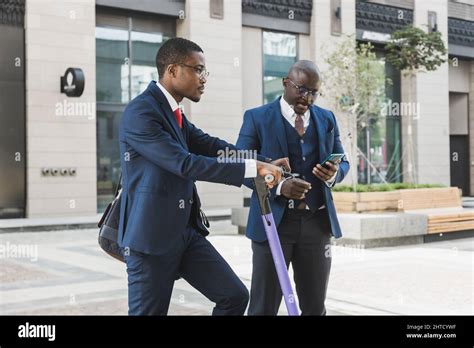 Meeting Of Two Partners Of Black African American Businessman In Suits