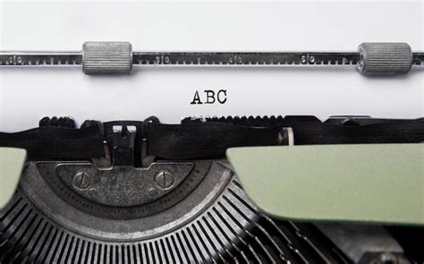Text Abc Typed On Retro Typewriter Premium Photo