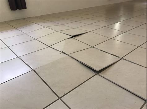 Loose Floor Tiles Repair How To Fix Loose Floor Tiles
