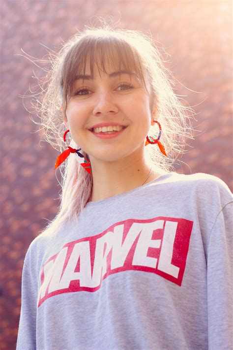 Woman Wearing Gray And Red Marvel Shirt Photo Free Girl Image On Unsplash