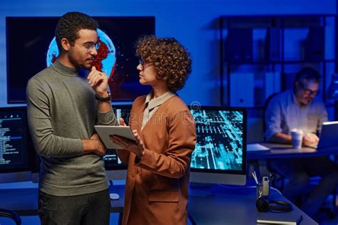 Two Young Confident Programmers Discussing Ideas For New Creative Project Stock Image Image Of