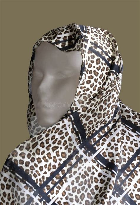 Serious Face On A Faux Model Head Looks To The Side And Keeps Her Head Protected With Silky