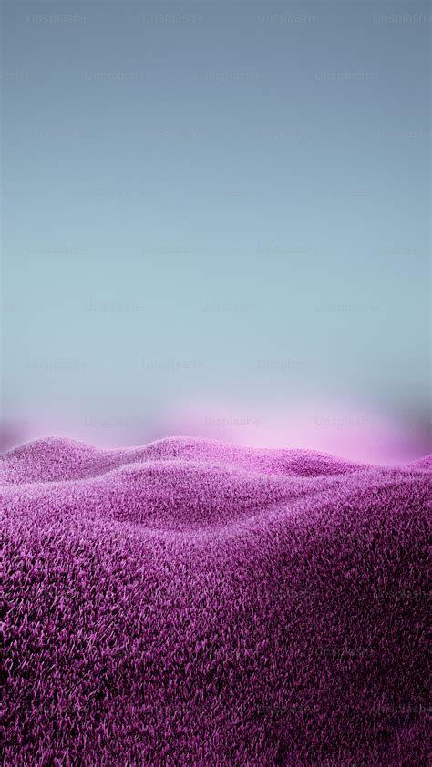 배경에 푸른 하늘이 있는 보라색 풍경 사진 Unsplash의 3d 이미지