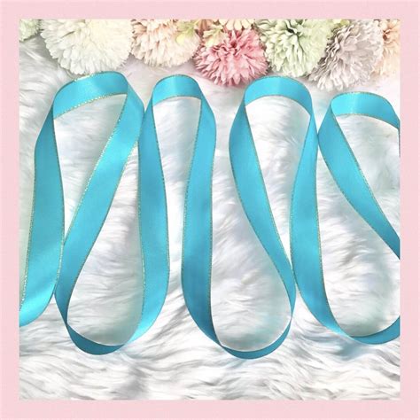 ริบบิ้นผ้าซาตินขอบทอง แบ่งขายเป็นหลา เลิฟกิฟ 123 Thaipick